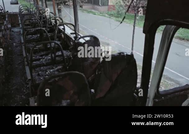 Bus after the fire. Explosion of a bomb in a passenger vehicle. The ...