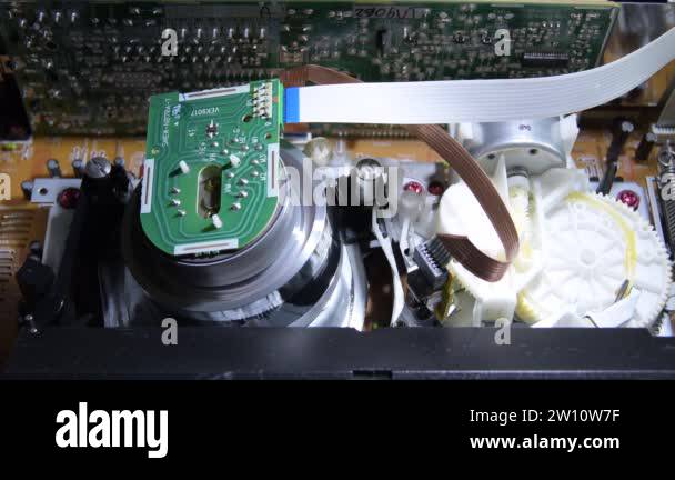Vhs video helical head mechanism stopping and ejecting a videotape ...