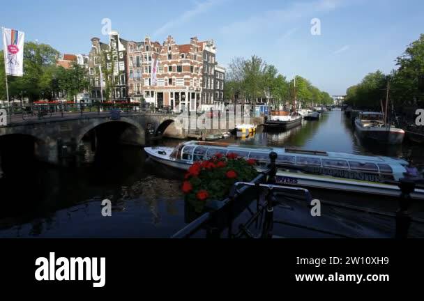 Amsterdam with its traditional Canal system and many bridges used by ...