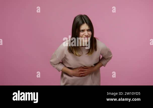 Stomachache painful Stock Videos & Footage - HD and 4K Video Clips - Alamy