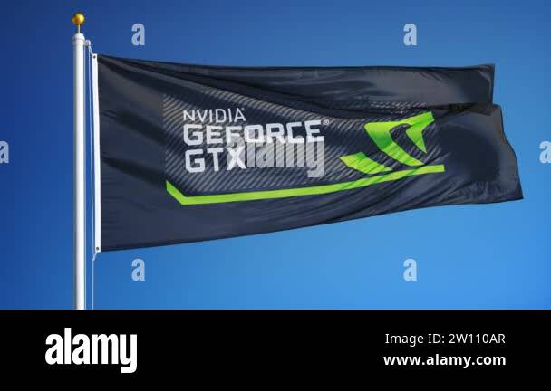 Nvidia GeForce GTX logo flag waving in slow motion against blue sky ...