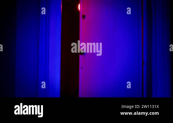 Red light flickers in an empty room. Crime scene. Fear of loneliness ...