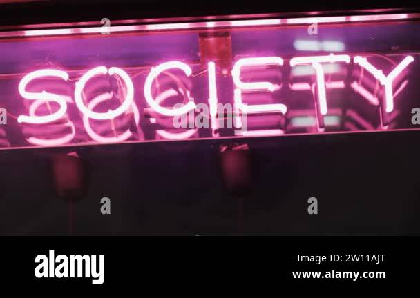 sign society word neon sign. pink light. glass showcases design Stock ...