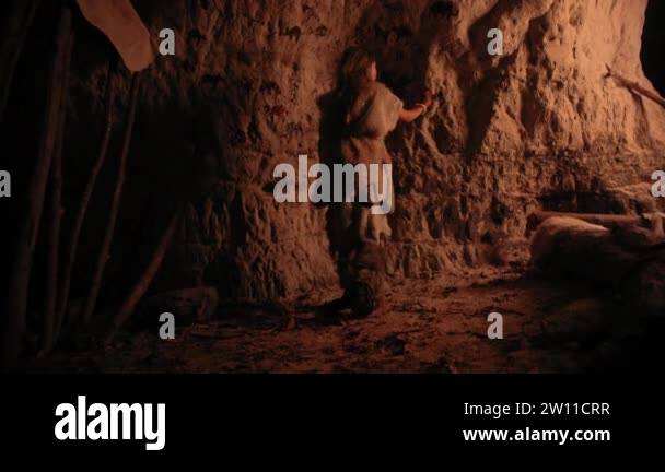 Primitive Prehistoric Neanderthal Child Wearing Animal Skin Draws ...