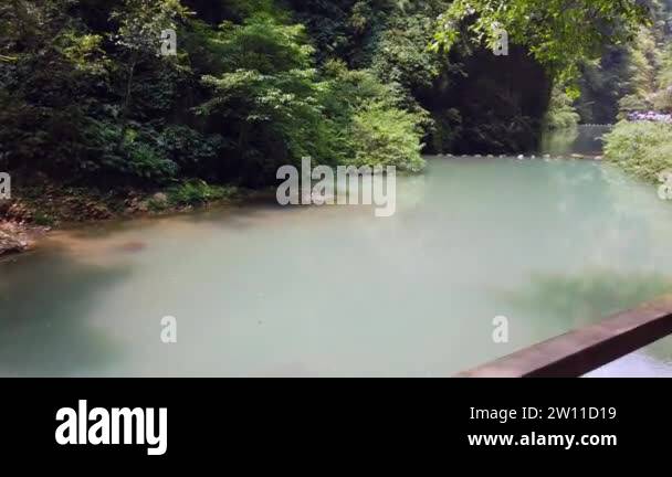 Protective wooden barriers on the side of the walking pathway along the ...