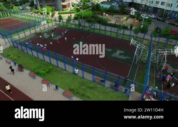 Boys playing football in courtyard Stock Videos & Footage - HD and 4K ...