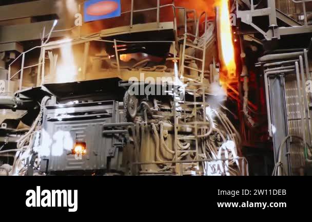 Steel production in a steelmaking furnace. Metallurgy. Casting ingot ...