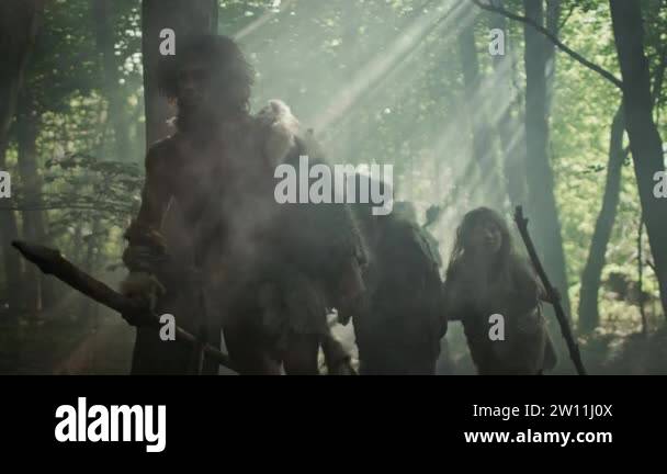 Tribe of Hunter-Gatherers Wearing Animal Skin Holding Stone Tipped ...