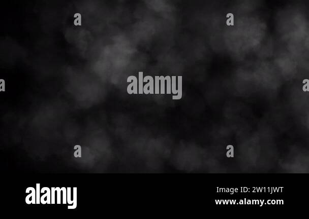 Puffs of magnificent smoke on an isolated black background. Atmospheric ...
