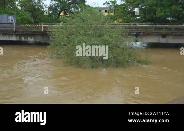Concrete bridge over the river in the high tide water rise of high ...