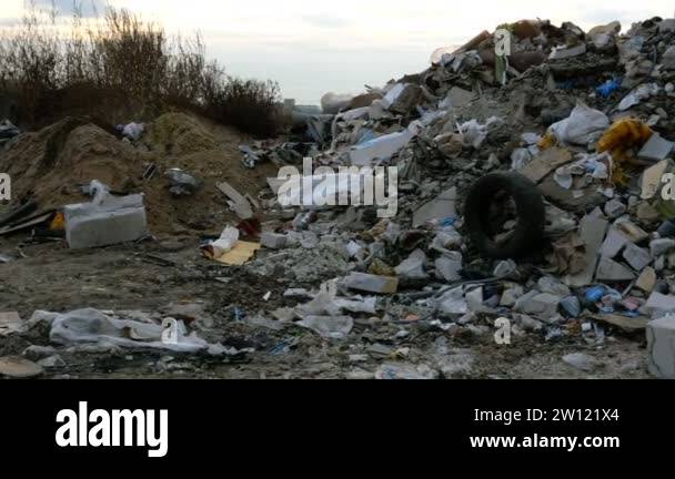 Industrial and household waste. Large garbage pile. Degraded garbage ...