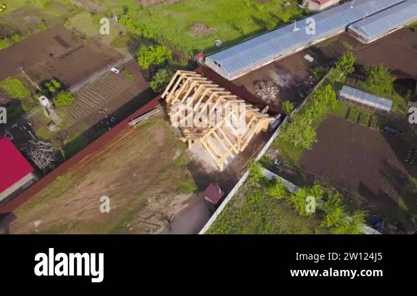 Plot with construction of wooden house. Clip. Top view on frame of ...