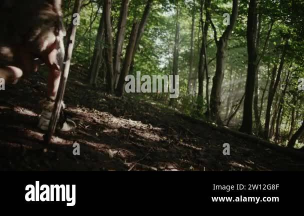 Tribe of Hunter-Gatherers Wearing Animal Skin Holding Stone Tipped ...