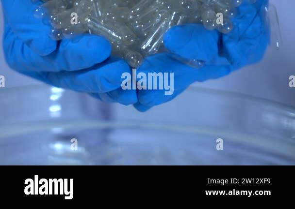 Pill capsule pouring Stock Videos & Footage - HD and 4K Video Clips - Alamy