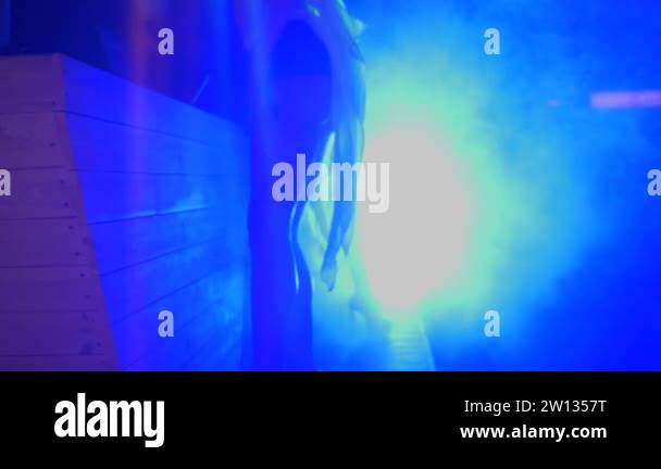 beautiful go-go, professional dancer moves his body in a night club at ...