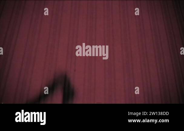 Vintage effect. A man kills his victim with an ax. old, glitch, retro ...