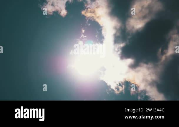 Dramatic Sky with Sun and Clouds in Real Time. Camera movement to give ...