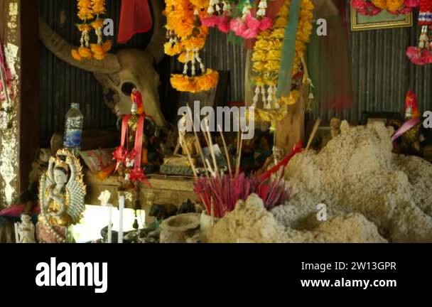 Wooden miniature guardian spirit house. Small buddhist temple shrine ...