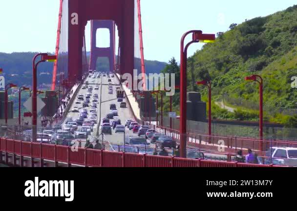 Traffic on the suspension bridge spanning the Golden Gate, the one-mile ...