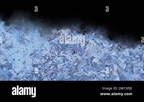 Beautiful frozen window melting animation from top to bottom, timelapse ...