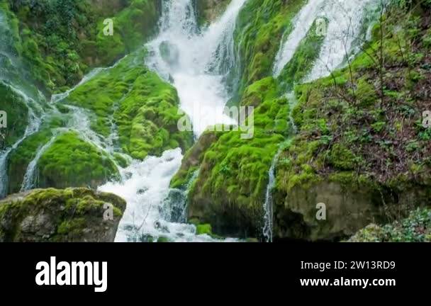 Three waterfalls and the water joins into one river which flows over ...