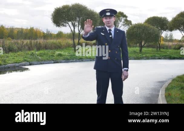 pilot welcomes waving commander airline aviator Stock Video Footage - Alamy