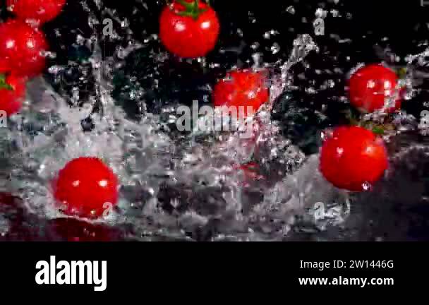 Tomatoes Falling Into Water Splash Stock Video Footage - Alamy