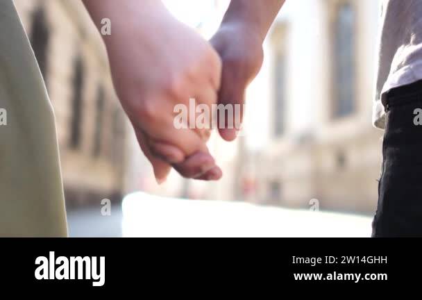 African and Caucasian hands together, stop racism. Love against racism ...