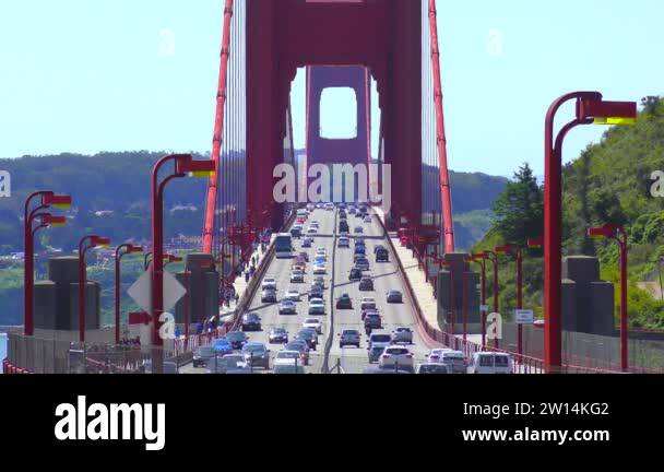 Traffic on the suspension bridge spanning the Golden Gate, the one-mile ...