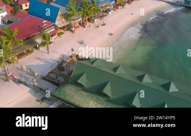 Aerial top view of Koh Touch village with colorful houses on the white ...