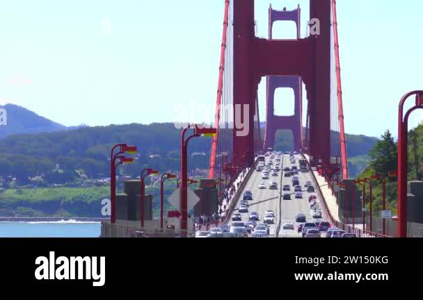 Traffic on the suspension bridge spanning the Golden Gate, the one-mile ...
