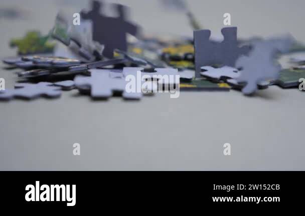 Puzzle pieces falling down. Business concept for key completion for ...