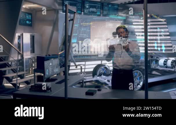 Automotive Engineers Analyzing Design and Performance of Electric Car Prototype using Augmented ...