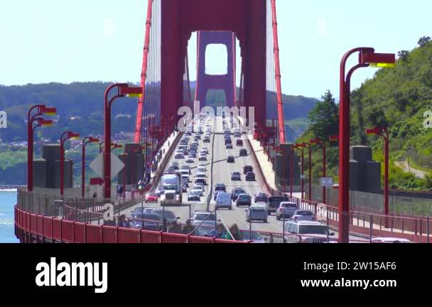 Traffic on the suspension bridge spanning the Golden Gate, the one-mile ...