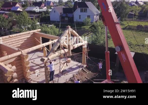 Installation of roof rafters wooden house. Clip. Top view of ...
