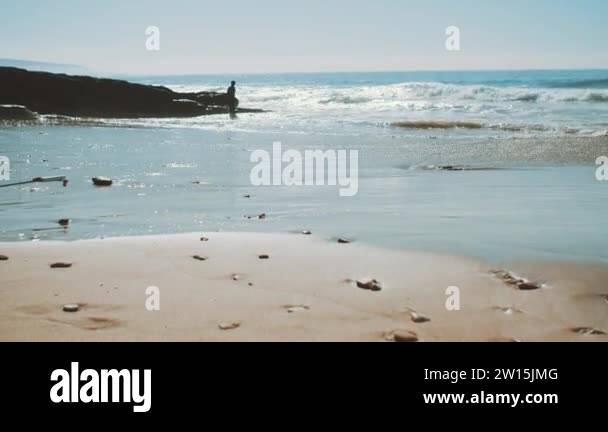 Close-up of beach sand drying after waves, view of beautiful seamless ...