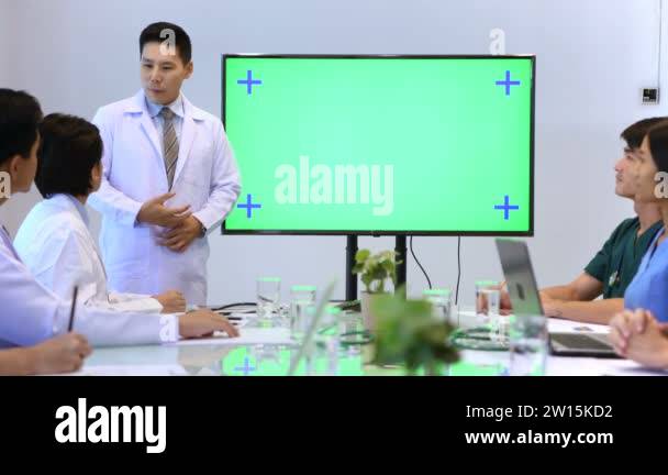 Medical concept. The doctor is explaining the meeting by previewing on ...