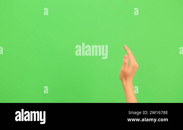 Palm of right male hand raising on green screen, chroma key. Closeup ...