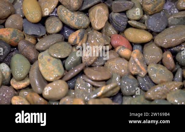 Pebbles pebble stone water Stock Videos & Footage - HD and 4K Video ...
