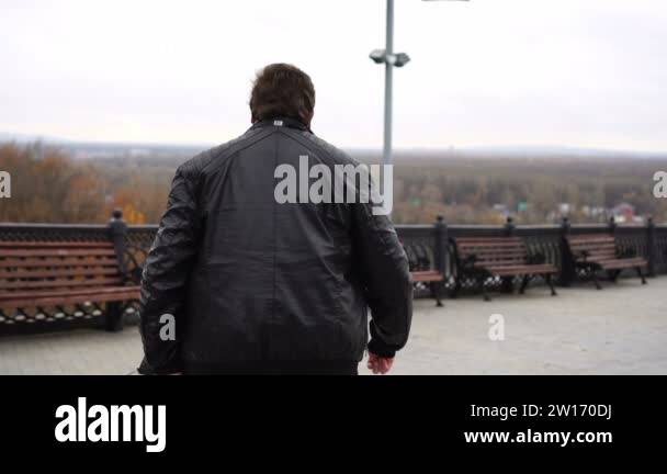 Back view of fat man walking at city Stock Video Footage - Alamy
