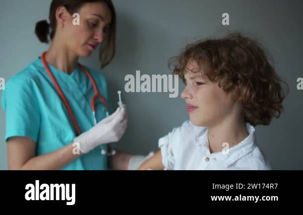 Boy getting needle Stock Videos & Footage - HD and 4K Video Clips - Alamy