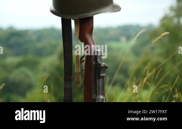 Memorial battlefield cross. Symbol of a fallen US soldier. M1 rifle ...