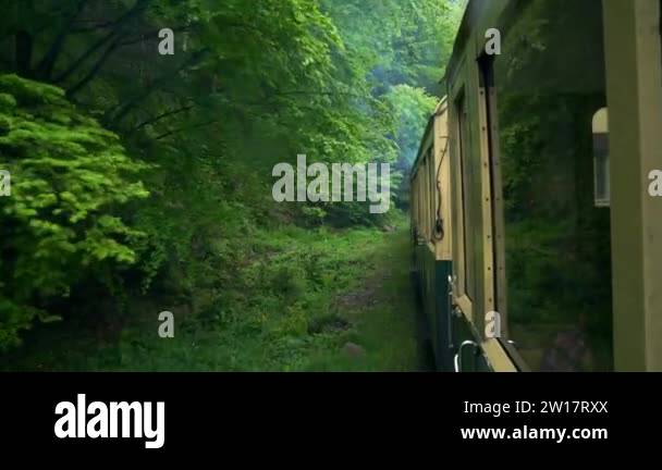 view from the roof of a retro train wagon, Old steam locomotive in ...