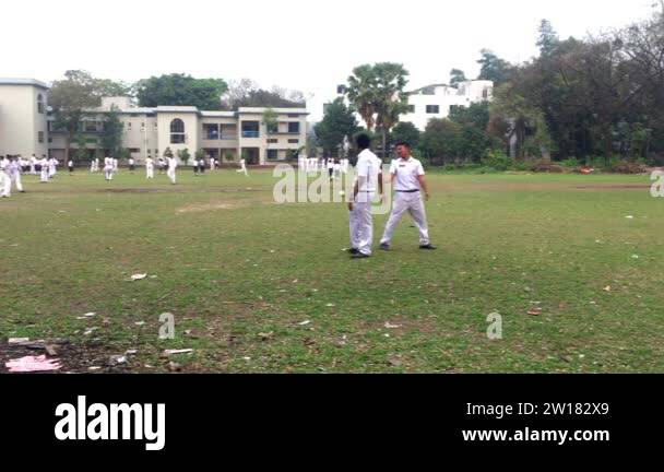 Young students playing cricket at the Dhaka Residential Model College ...