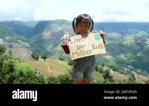 Child girl holding "Save the planet" Poster showing a sign protesting ...