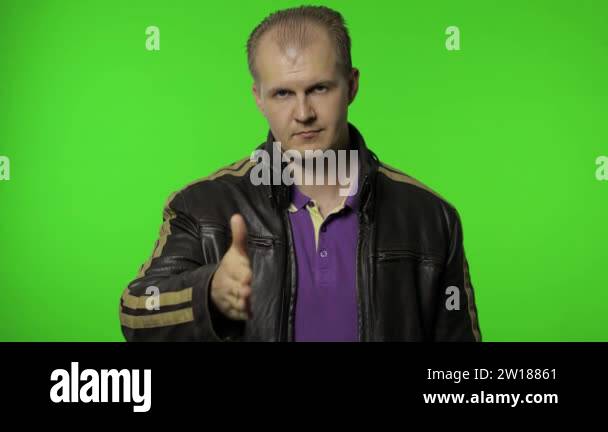 Man rocker offering handshake, greeting with kind smile, welcoming ...