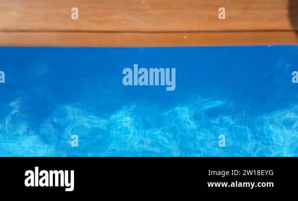 swimming pool surface caustics ripple like sea water and flow with ...