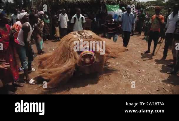 Monster dancing at a ceremony in Africa Stock Video Footage - Alamy