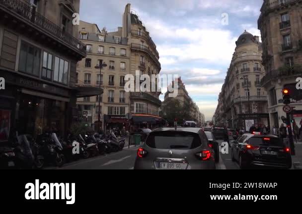PARIS, FRANCE- October 2018: Driving along a Typical Parisian street ...