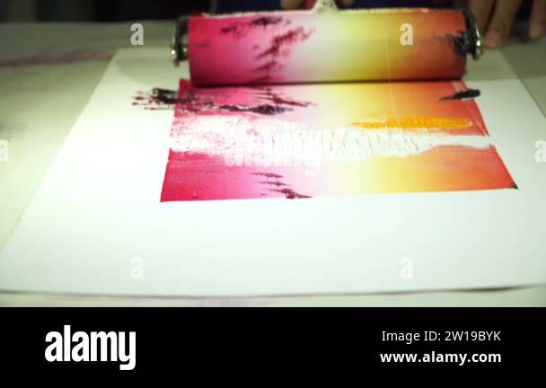 Mixing colors using a roller to rotate colors so that each color is ...